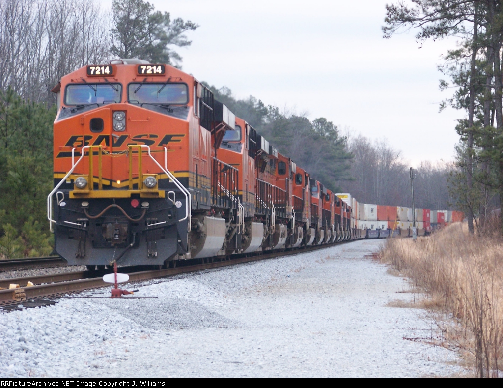 BNSF 7214 on the lead of X010